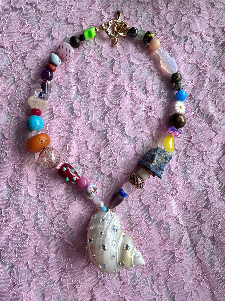 The pearly shell and the donut and the daisy and the white fish ...
